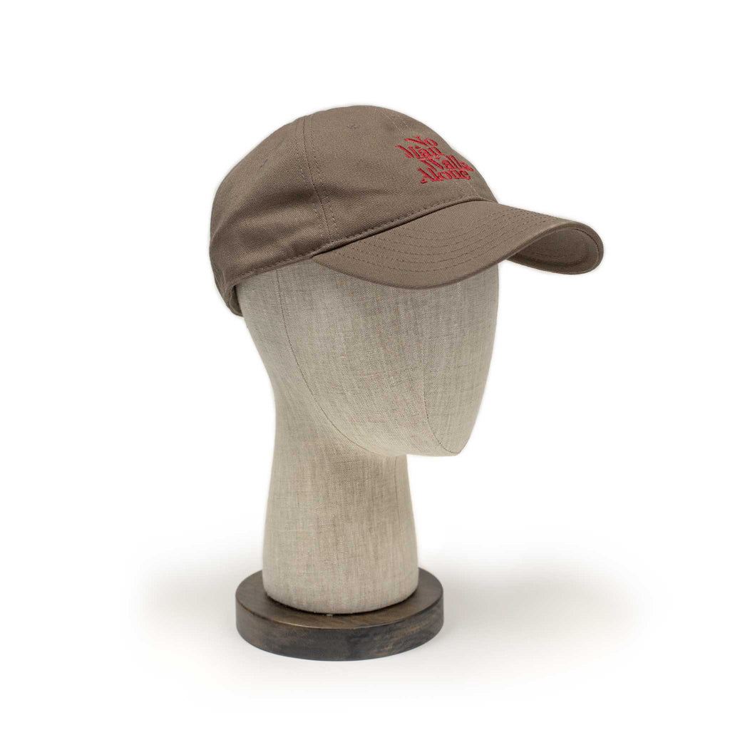 No Man Walks Alone SS25 No Man Fam embroidered cap in taupe brown canvas