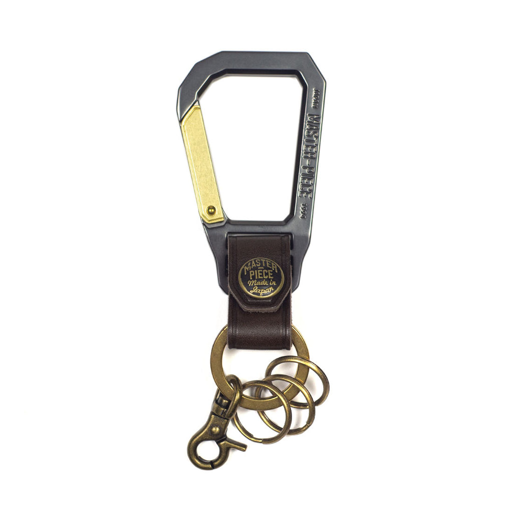 Master-Piece Caribiner key ring in brown leather – No Man Walks Alone