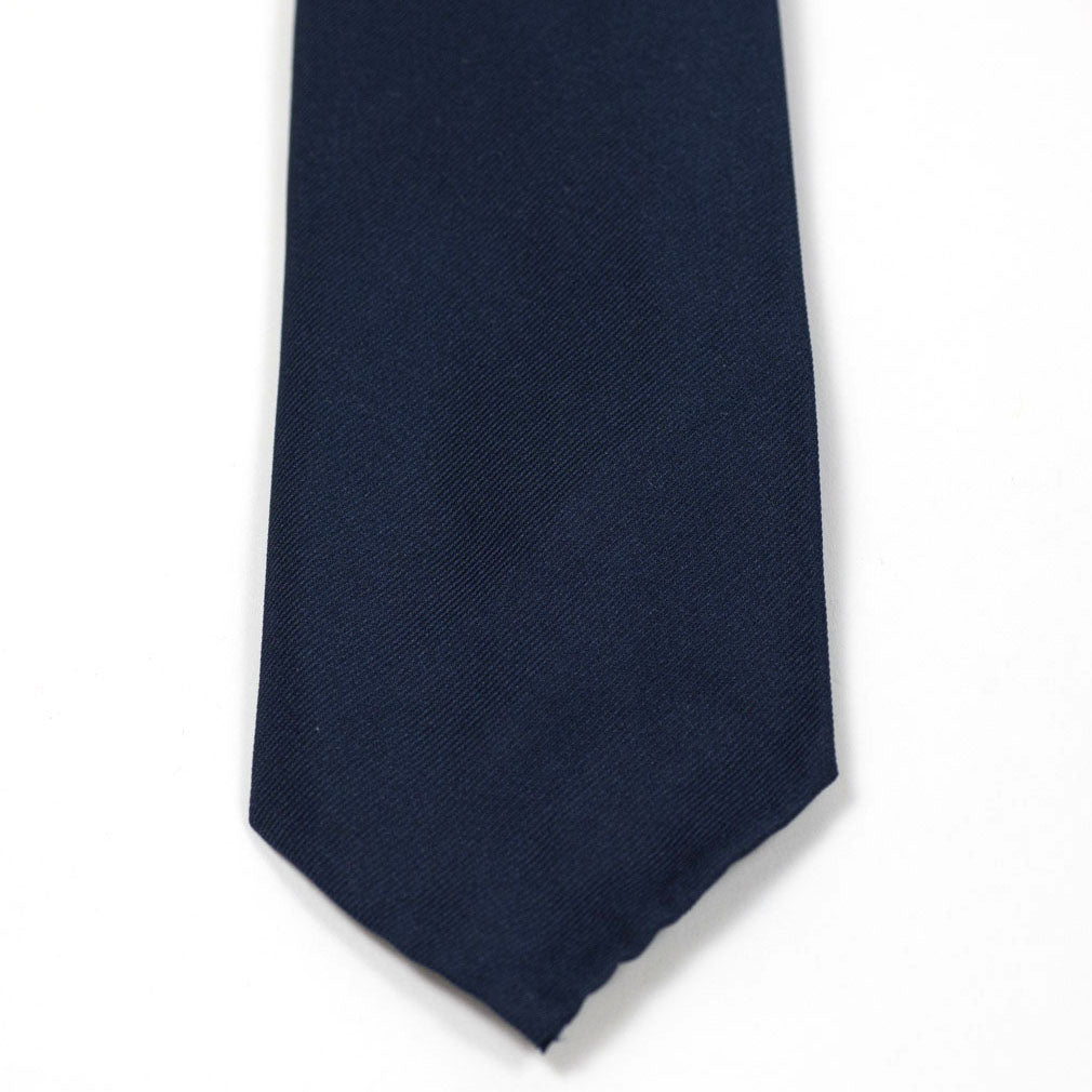 Untipped and handrolled navy reppe silk tie – No Man Walks Alone